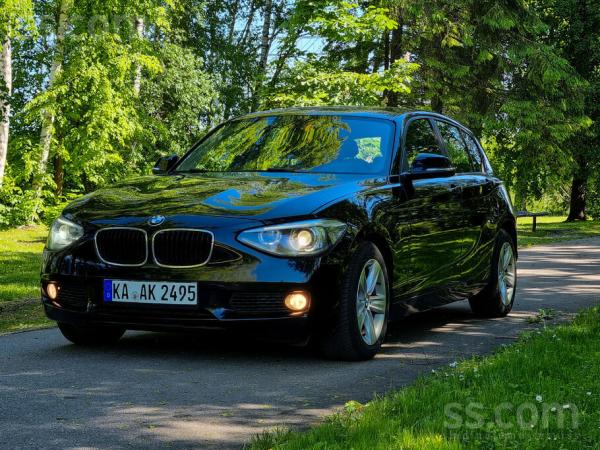 Black BMW 120 2013 in Riga, with an engine capacity of 2.00 L and mileage of 238 thousand km for 6350 €, photo 1 on AUTOMOTO.COM.LV