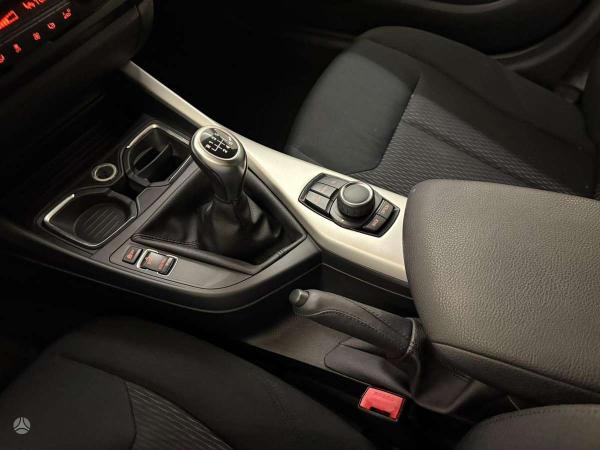 Black BMW 120 2013 in Marijampole, with an engine capacity of 2.00 L and mileage of 256 thousand km for 5750 €, photo 4 on AUTOMOTO.COM.LV