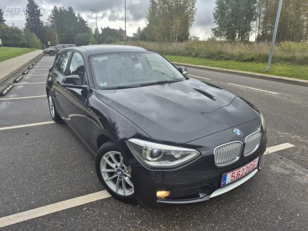 Black BMW 120 2013 in Vilnius, with an engine capacity of 2.00 L and mileage of 254 thousand km for 6399 €, photo 6 on AUTOMOTO.COM.LV