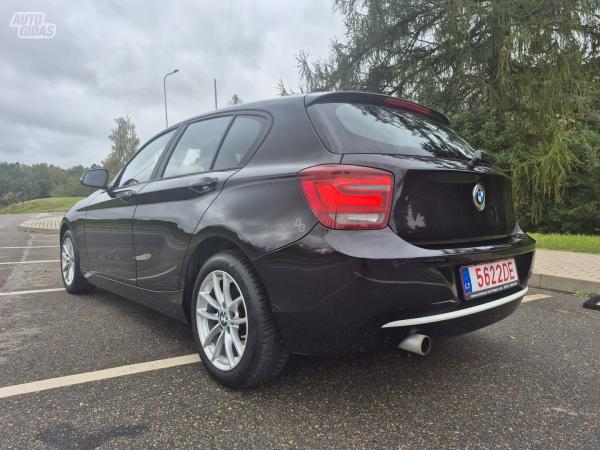 Black BMW 120 2013 in Vilnius, with an engine capacity of 2.00 L and mileage of 254 thousand km for 6399 €, photo 11 on AUTOMOTO.COM.LV