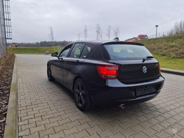 Black BMW 120 2014 in Vilnius, with an engine capacity of 2.00 L and mileage of 212 thousand km for 6190 €, photo 4 on AUTOMOTO.COM.LV