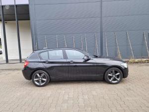 Black BMW 120 2014 in Vilnius, with an engine capacity of 2.00 L and mileage of 212 thousand km for 6190 €, photo 6 on AUTOMOTO.COM.LV