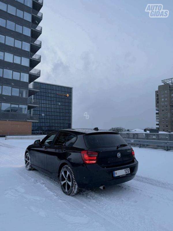 Black BMW 120 2014 in Vilnius, with an engine capacity of 2.00 L and mileage of 231 thousand km for 9200 €, photo 4 on AUTOMOTO.COM.LV