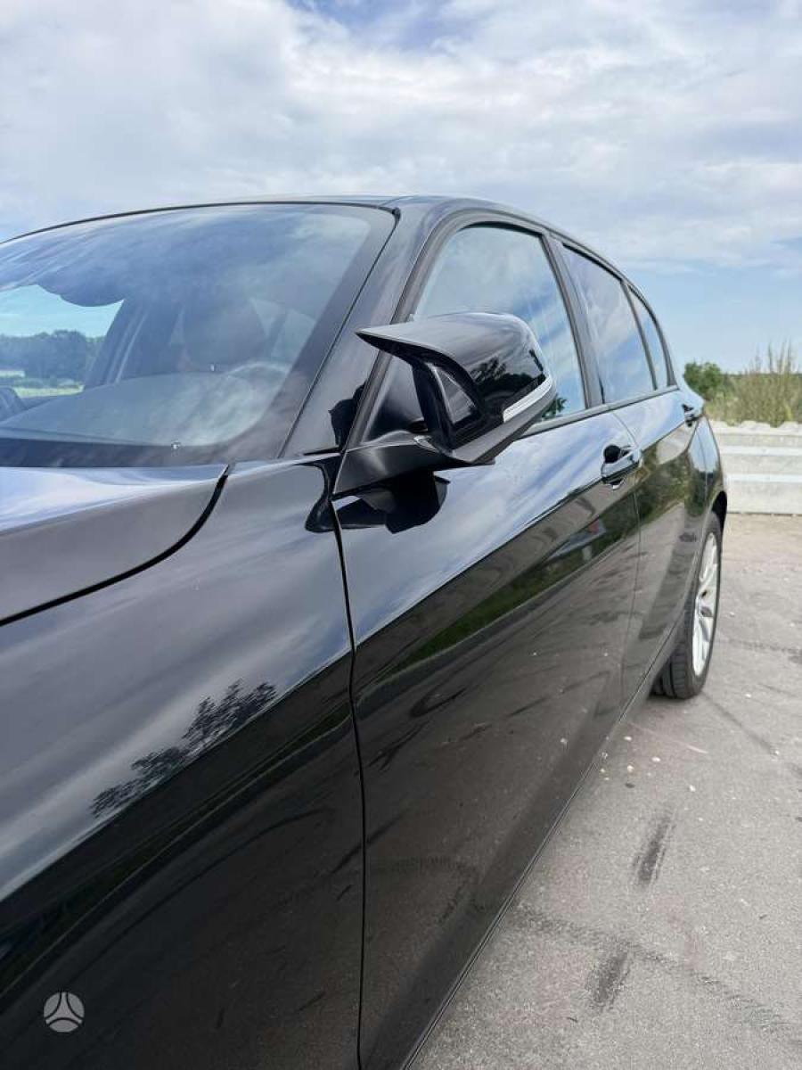 Black BMW 120 2014 in Kaunas, with an engine capacity of 2.00 L and mileage of 176 thousand km for 7300 €, photo 13 on AUTOMOTO.COM.LV