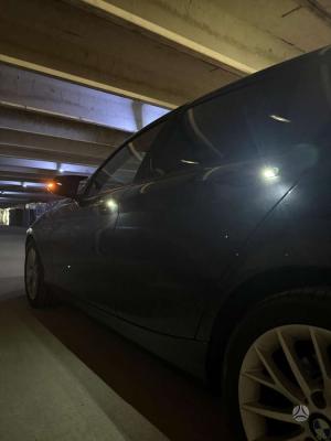 Black BMW 120 2014 in Kaunas, with an engine capacity of 2.00 L and mileage of 176 thousand km for 7300 €, photo 14 on AUTOMOTO.COM.LV