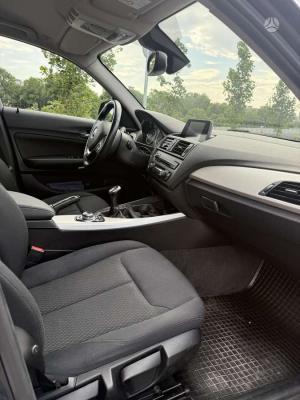 Black BMW 120 2014 in Kaunas, with an engine capacity of 2.00 L and mileage of 176 thousand km for 7300 €, photo 18 on AUTOMOTO.COM.LV
