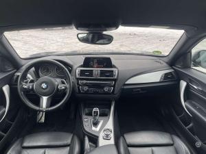 Black BMW 120 2016 in Kaunas, with an engine capacity of 2.00 L and mileage of 290 thousand km for 8450 €, photo 18 on AUTOMOTO.COM.LV