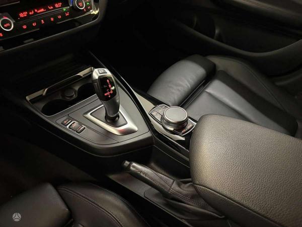 Black BMW 120 2018 in Marijampole, with an engine capacity of 2.00 L and mileage of 154 thousand km for 14950 €, photo 3 on AUTOMOTO.COM.LV