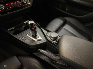 Black BMW 120 2018 in Marijampole, with an engine capacity of 2.00 L and mileage of 154 thousand km for 14950 €, photo 4 on AUTOMOTO.COM.LV