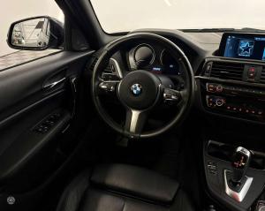 Black BMW 120 2018 in Marijampole, with an engine capacity of 2.00 L and mileage of 154 thousand km for 14950 €, photo 18 on AUTOMOTO.COM.LV