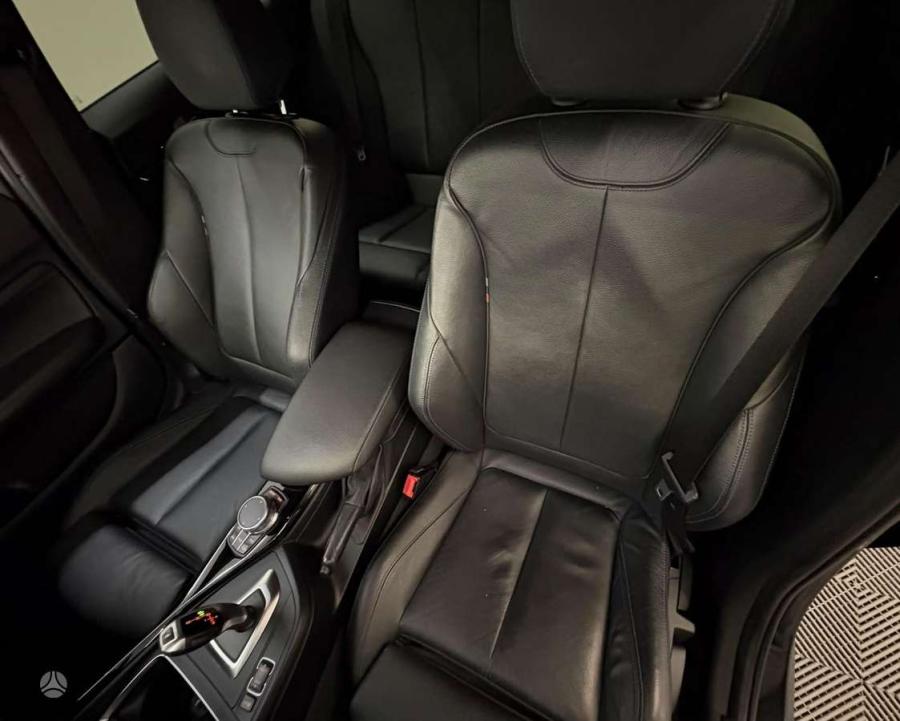 Black BMW 120 2018 in Marijampole, with an engine capacity of 2.00 L and mileage of 154 thousand km for 14950 €, photo 22 on AUTOMOTO.COM.LV