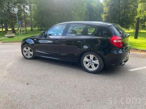 Black BMW 120 2010 in Riga, with an engine capacity of 2.00 L and mileage of 302 thousand km for 2500 €, photo 3 on AUTOMOTO.COM.LV