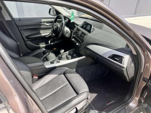 Brown BMW 120 2012 in Siauliai, with an engine capacity of 2.00 L and mileage of 266 thousand km for 5850 €, photo 15 on AUTOMOTO.COM.LV
