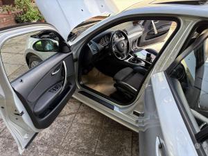 Grey BMW 120 2008 in Birstonas, with an engine capacity of 2.00 L and mileage of 271 thousand km for 3299 €, photo 14 on AUTOMOTO.COM.LV