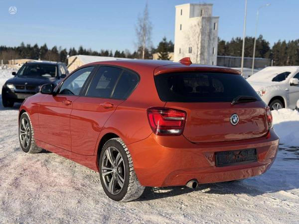 Orange BMW 120 2013 in Utena, with an engine capacity of 2.00 L and mileage of 235 thousand km for 8850 €, photo 5 on AUTOMOTO.COM.LV