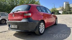 Red BMW 120 2005 in Riga, with an engine capacity of 2.00 L and mileage of 215 thousand km for 1300 €, photo 4 on AUTOMOTO.COM.LV