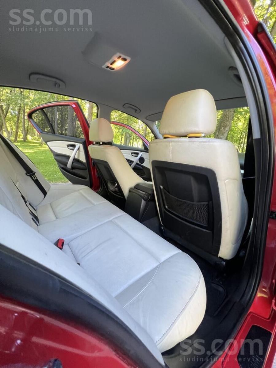 Red BMW 120 2008 in Liepaja, with an engine capacity of 2.00 L and mileage of 244 thousand km for 4290 €, photo 10 on AUTOMOTO.COM.LV