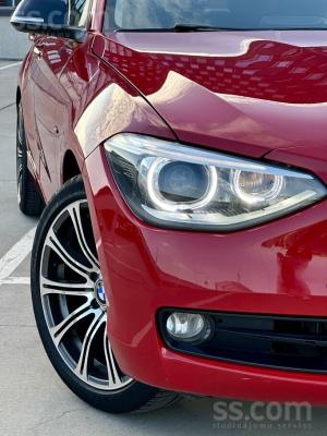 Red BMW 120 2011 in Riga, with an engine capacity of 2.00 L and mileage of 254 thousand km for 8490 €, photo 3 on AUTOMOTO.COM.LV