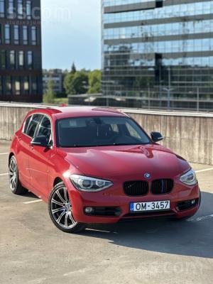 Red BMW 120 2011 in Riga, with an engine capacity of 2.00 L and mileage of 254 thousand km for 8490 €, photo 5 on AUTOMOTO.COM.LV