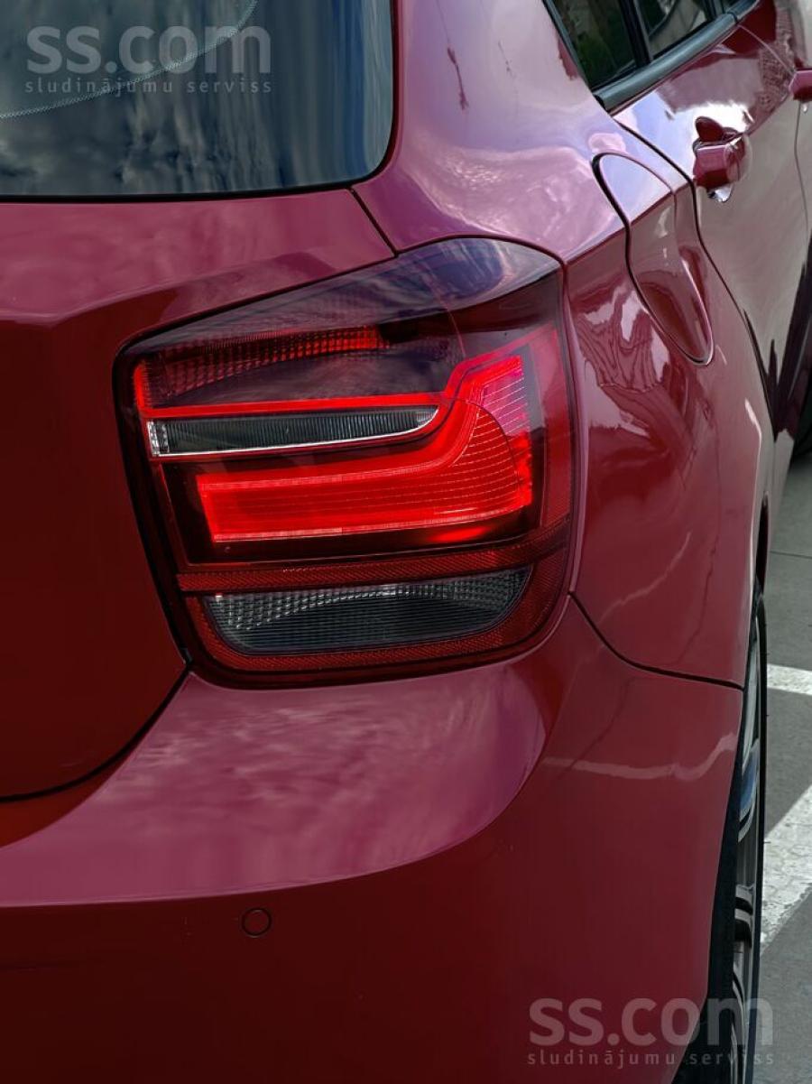 Red BMW 120 2011 in Riga, with an engine capacity of 2.00 L and mileage of 254 thousand km for 8490 €, photo 6 on AUTOMOTO.COM.LV