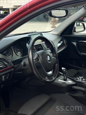 Red BMW 120 2011 in Riga, with an engine capacity of 2.00 L and mileage of 254 thousand km for 8490 €, photo 10 on AUTOMOTO.COM.LV