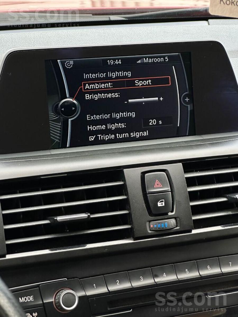 Red BMW 120 2011 in Riga, with an engine capacity of 2.00 L and mileage of 254 thousand km for 8490 €, photo 14 on AUTOMOTO.COM.LV