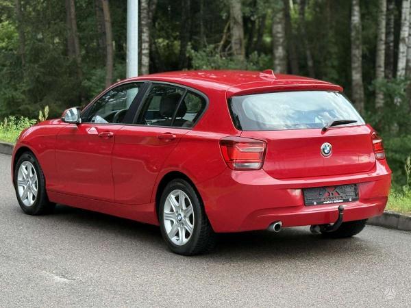 Red BMW 120 2012 in Ukmerge, with an engine capacity of 2.00 L and mileage of 300 thousand km for 5250 €, photo 5 on AUTOMOTO.COM.LV