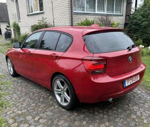 Red BMW 120 2012 in Sakiai, with an engine capacity of 2.00 L and mileage of 221 thousand km for 5400 €, photo 4 on AUTOMOTO.COM.LV