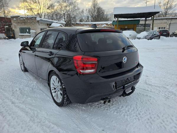 Black BMW 125 2012 in Telschi, with an engine capacity of 2.00 L and mileage of 284 thousand km for 6200 €, photo 4 on AUTOMOTO.COM.LV