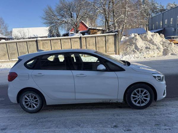 White BMW 216 Active Tourer 2015 in Vilnius, with an engine capacity of 1.50 L and mileage of 241 thousand km for 5200 €, photo 4 on AUTOMOTO.COM.LV