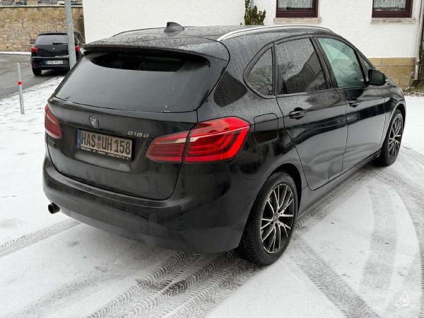 Black BMW 218 Active Tourer 2014 in Utena, with an engine capacity of 2.00 L and mileage of 280 thousand km for 7599 €, photo 2 on AUTOMOTO.COM.LV