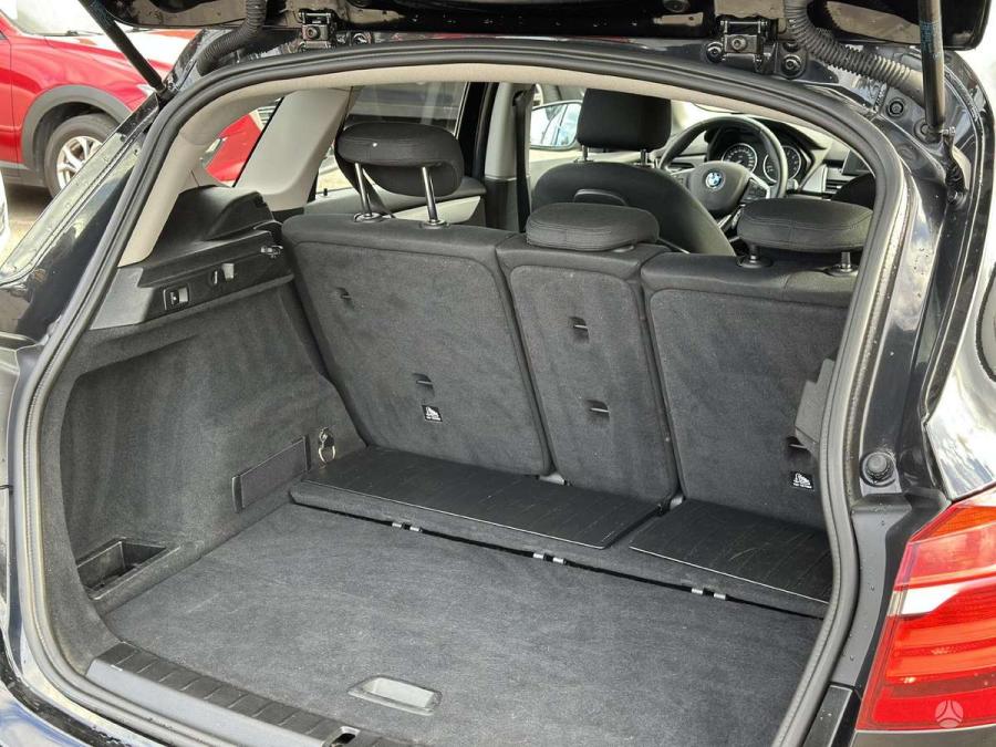 Black BMW 218 Active Tourer 2015 in Vilnius, with an engine capacity of 1.50 L and mileage of 220 thousand km for 7000 €, photo 15 on AUTOMOTO.COM.LV