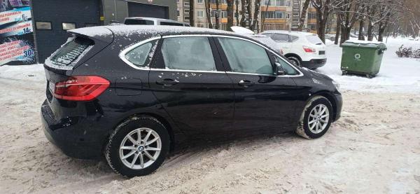 Black BMW 218 Active Tourer 2015 in Kaunas, with an engine capacity of 2.00 L and mileage of 289 thousand km for 6650 €, photo 7 on AUTOMOTO.COM.LV
