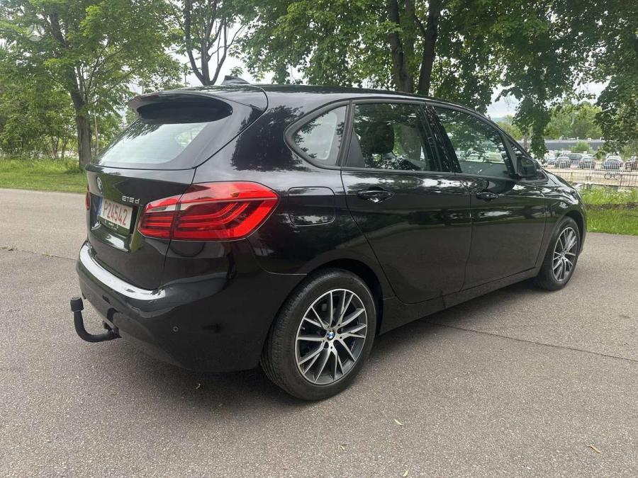 Black BMW 218 Active Tourer 2015 in Alytus, with an engine capacity of 2.00 L and mileage of 300 thousand km for 7600 €, photo 5 on AUTOMOTO.COM.LV