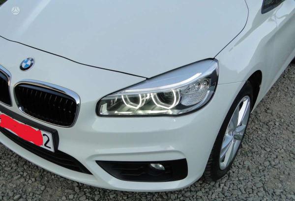 White BMW 218 Active Tourer 2015 in Vilnius, with an engine capacity of 1.50 L and mileage of 102 thousand km for 8400 €, photo 7 on AUTOMOTO.COM.LV
