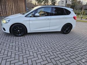 White BMW 218 Active Tourer 2018 in Utena, with an engine capacity of 2.00 L and mileage of 203 thousand km for 12999 €, photo 9 on AUTOMOTO.COM.LV