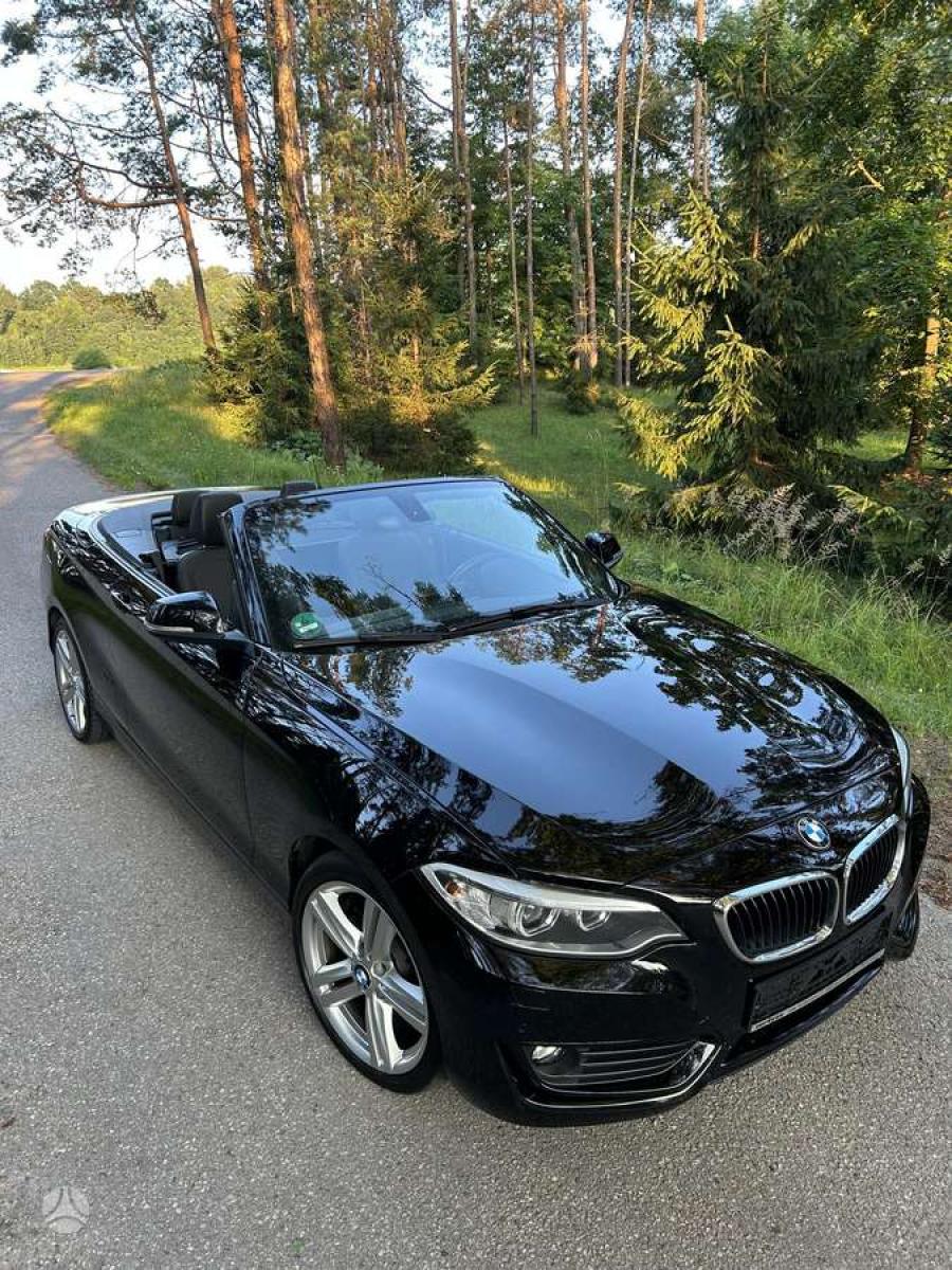 Black BMW 218 2015 in Kaunas, with an engine capacity of 2.00 L and mileage of 184 thousand km for 12900 €, photo 1 on AUTOMOTO.COM.LV