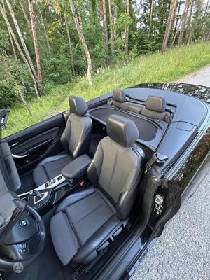 Black BMW 218 2015 in Kaunas, with an engine capacity of 2.00 L and mileage of 184 thousand km for 12900 €, photo 18 on AUTOMOTO.COM.LV