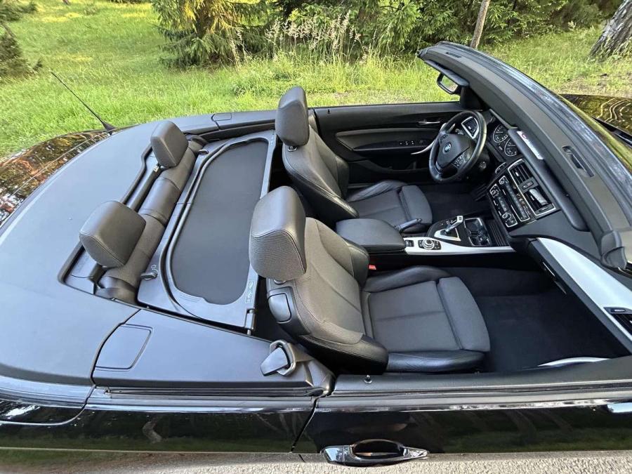 Black BMW 218 2015 in Kaunas, with an engine capacity of 2.00 L and mileage of 184 thousand km for 12900 €, photo 22 on AUTOMOTO.COM.LV