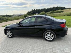 Black BMW 218 2015 in Vilnius, with an engine capacity of 2.00 L and mileage of 189 thousand km for 8450 €, photo 6 on AUTOMOTO.COM.LV