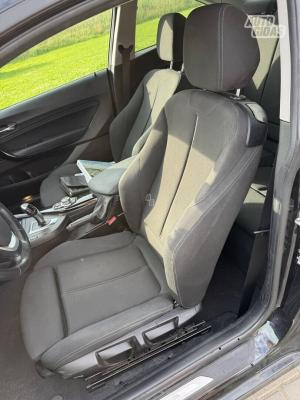 Black BMW 218 2015 in Vilnius, with an engine capacity of 2.00 L and mileage of 189 thousand km for 8450 €, photo 10 on AUTOMOTO.COM.LV
