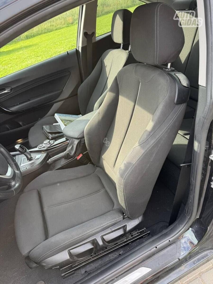 Black BMW 218 2015 in Vilnius, with an engine capacity of 2.00 L and mileage of 189 thousand km for 8450 €, photo 10 on AUTOMOTO.COM.LV