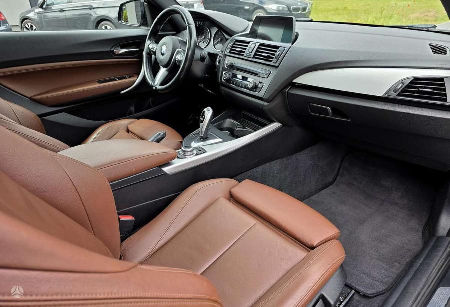 Black BMW 218 2015 in Vilnius, with an engine capacity of 2.00 L and mileage of 179 thousand km for 12250 €, photo 7 on AUTOMOTO.COM.LV