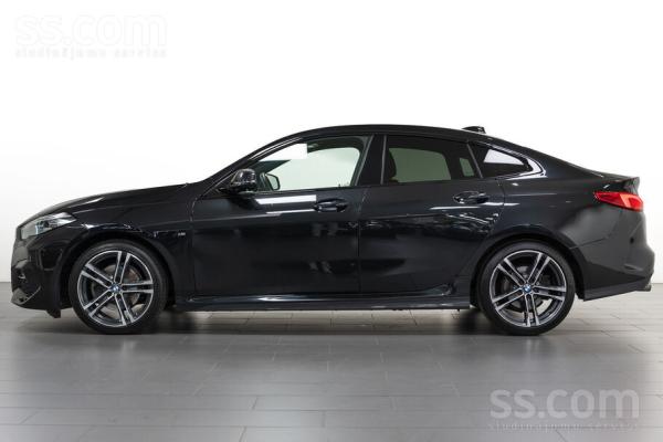 Black BMW 218 2020 in Riga, with an engine capacity of 1.50 L and mileage of 115 thousand km for 19500 €, photo 3 on AUTOMOTO.COM.LV