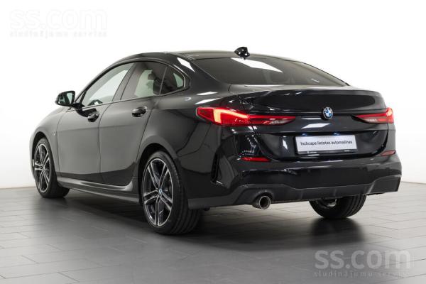 Black BMW 218 2020 in Riga, with an engine capacity of 1.50 L and mileage of 115 thousand km for 19500 €, photo 4 on AUTOMOTO.COM.LV