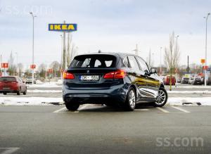 Black BMW 218 2015 in Riga, with an engine capacity of 2.00 L and mileage of 254 thousand km for 8990 €, photo 6 on AUTOMOTO.COM.LV
