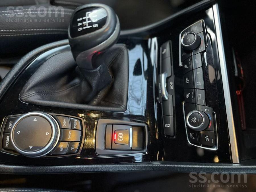 Black BMW 218 2015 in Riga, with an engine capacity of 1.50 L and mileage of 156 thousand km for 9990 €, photo 8 on AUTOMOTO.COM.LV