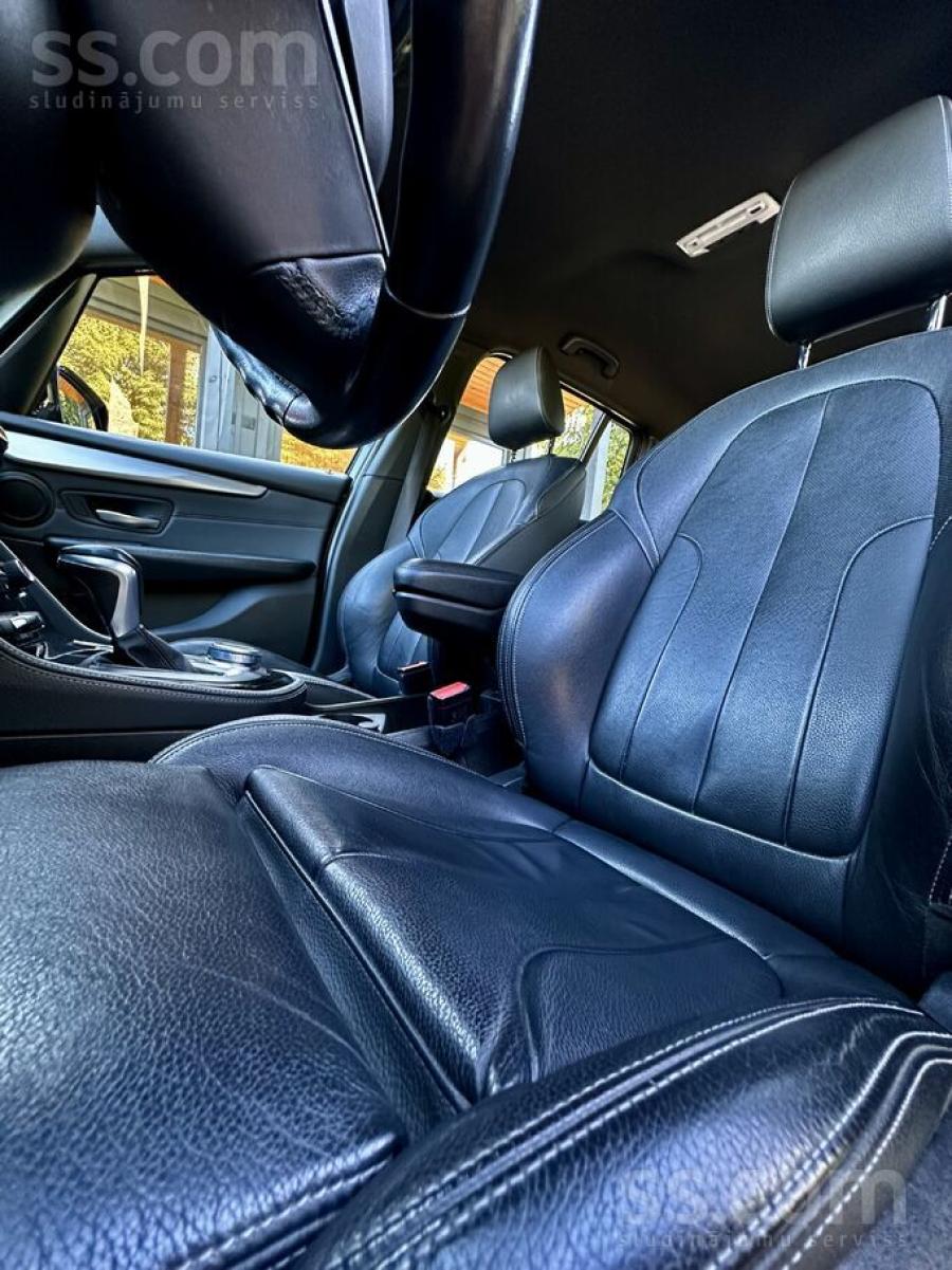 Black BMW 218 2018 in Riga, with an engine capacity of 2.00 L and mileage of 231 thousand km for 13500 €, photo 14 on AUTOMOTO.COM.LV