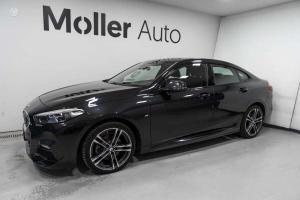 Black BMW 218 2022 in Vilnius, with an engine capacity of 2.00 L and mileage of 81 thousand km for 22900 €, photo 3 on AUTOMOTO.COM.LV