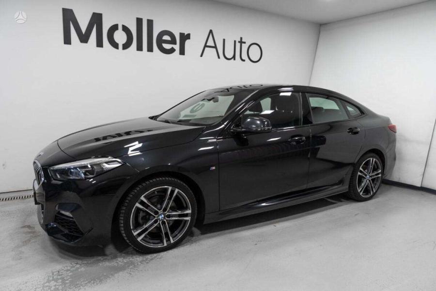 Black BMW 218 2022 in Vilnius, with an engine capacity of 2.00 L and mileage of 81 thousand km for 22900 €, photo 3 on AUTOMOTO.COM.LV
